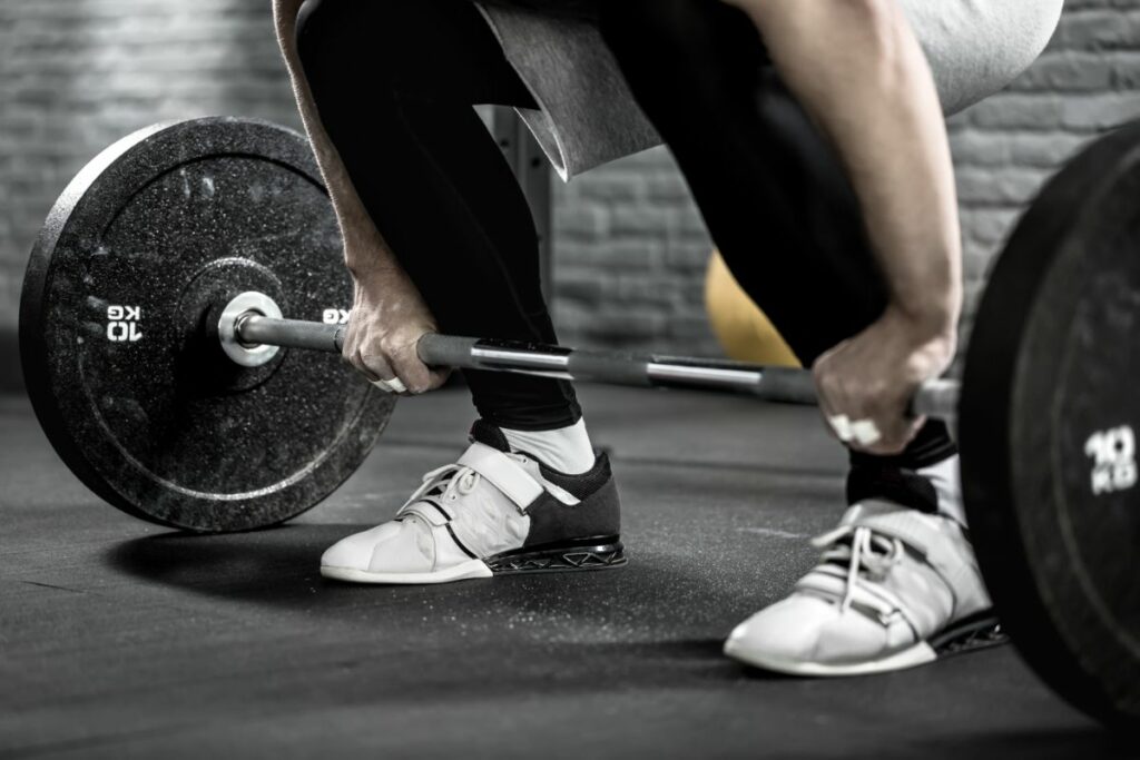 7 Essential Barbell Exercises To Get Stronger - Qwik Fitness