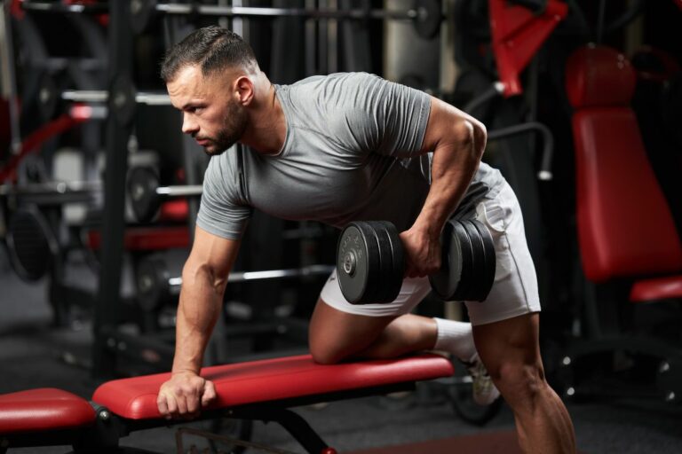 Best Dumbbell Trap Exercises For Mass And Strength - Qwik Fitness